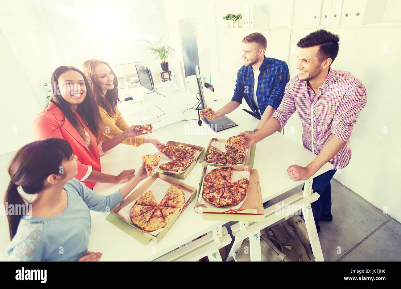 Asian girl eating delicious pizza hi-res stock photography and images ...