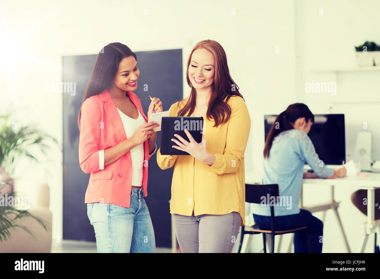 creative team with table pc in office Stock Photo - Alamy
