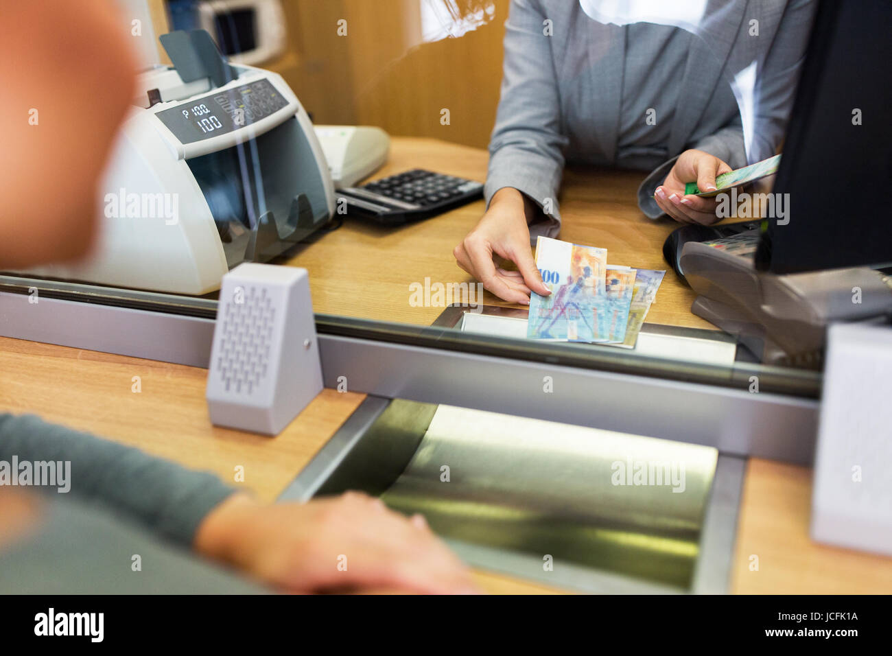 clerk counting cash money at bank office Stock Photo - Alamy