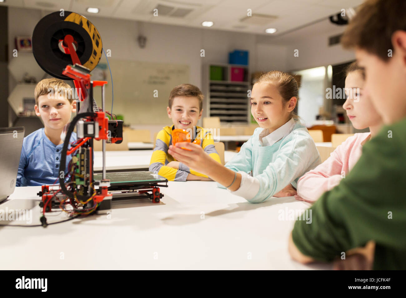 happy children with 3d printer at robotics school Stock Photo - Alamy