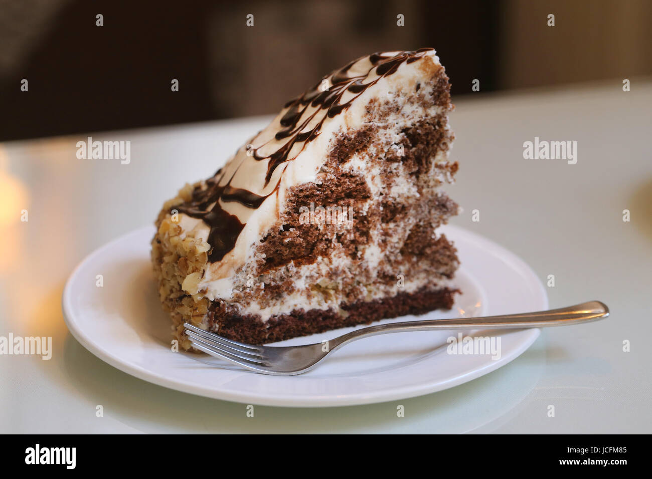 Photo of a sweet truffle cake in a cafe Stock Photo - Alamy