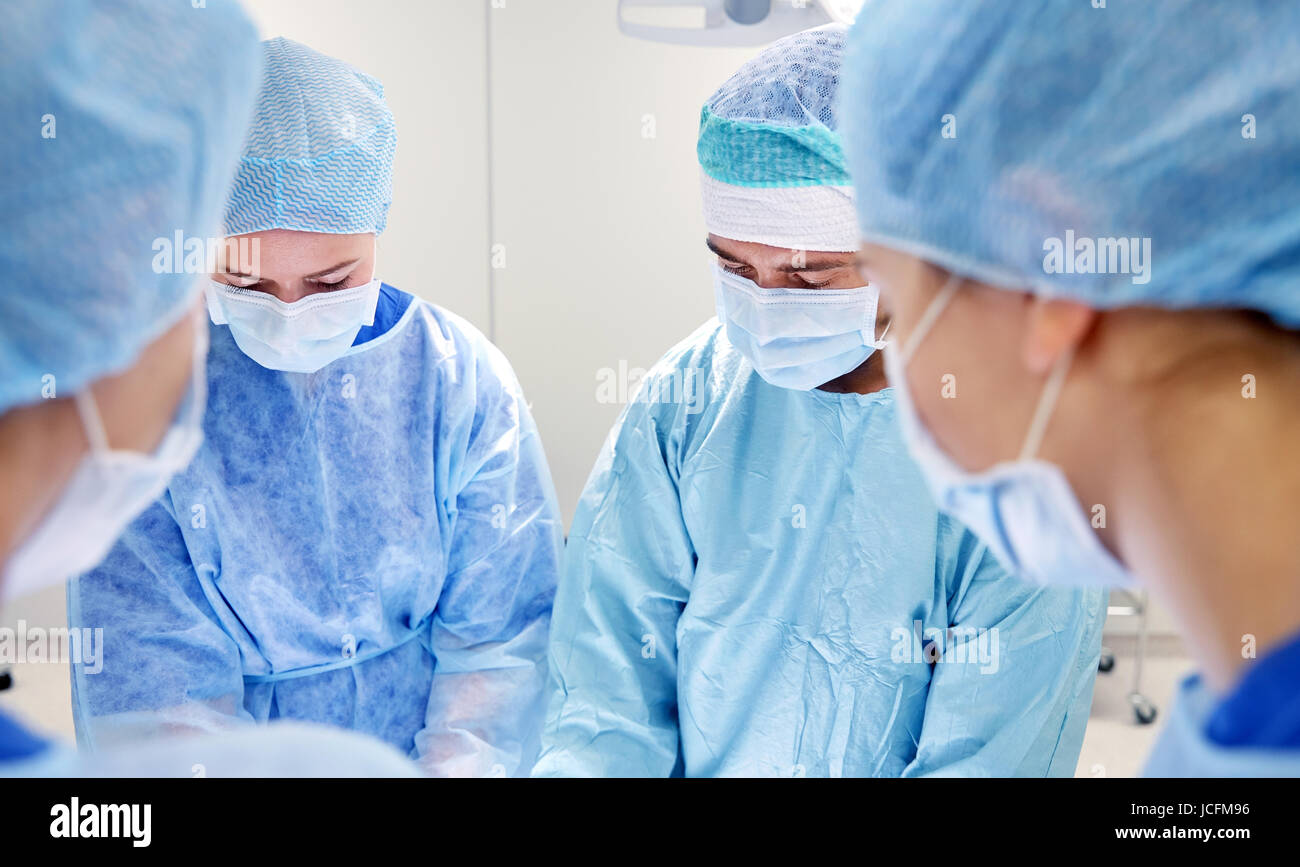 group of surgeons in operating room at hospital Stock Photo - Alamy