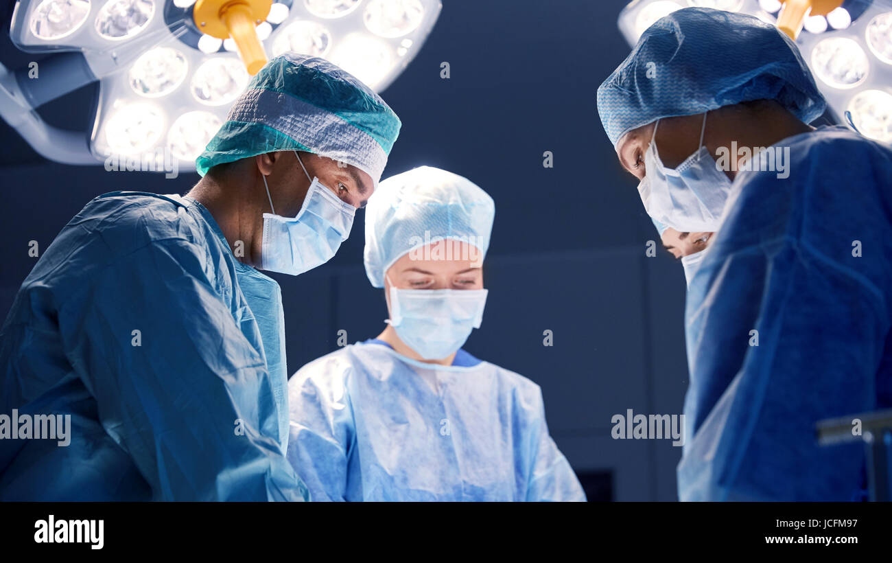 group of surgeons in operating room at hospital Stock Photo - Alamy