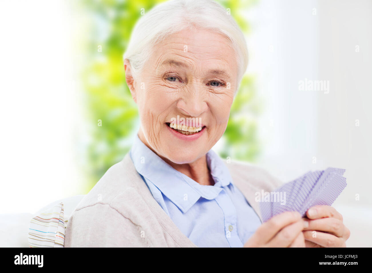 Happy Senior Woman Playing Cards At Home Stock Photo Alamy happy-senior-woman-playing-cards-at-home-stock-photo-alamy