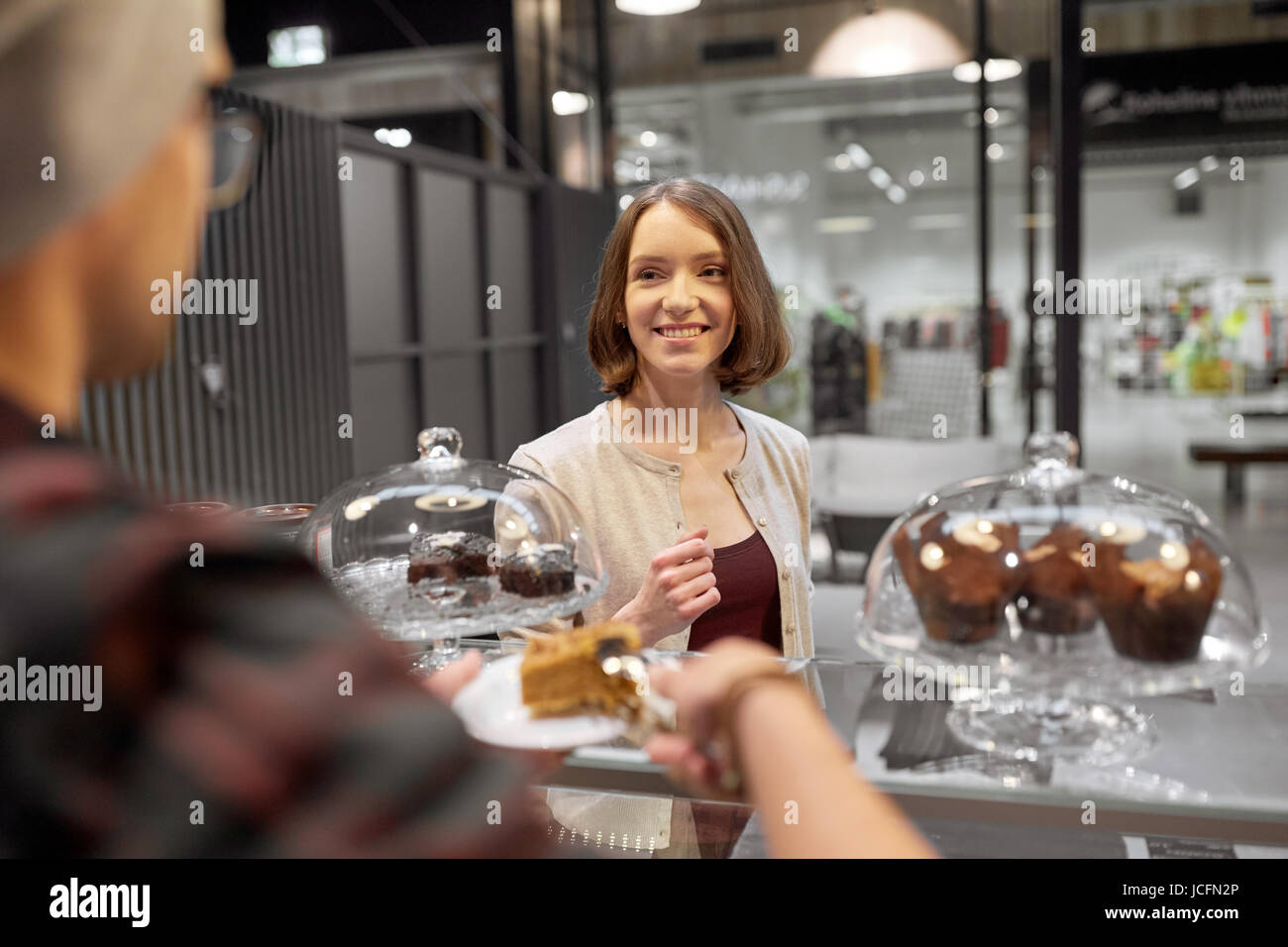 Woman man customer serving hi-res stock photography and images - Alamy