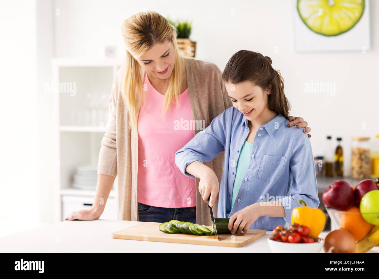 happy family cooking dinner at home kitchen Stock Photo - Alamy