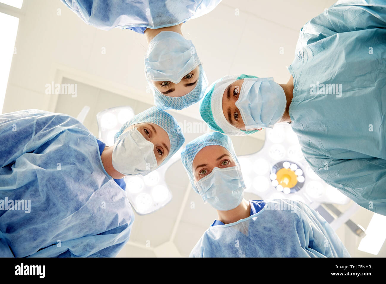 group of surgeons in operating room at hospital Stock Photo - Alamy