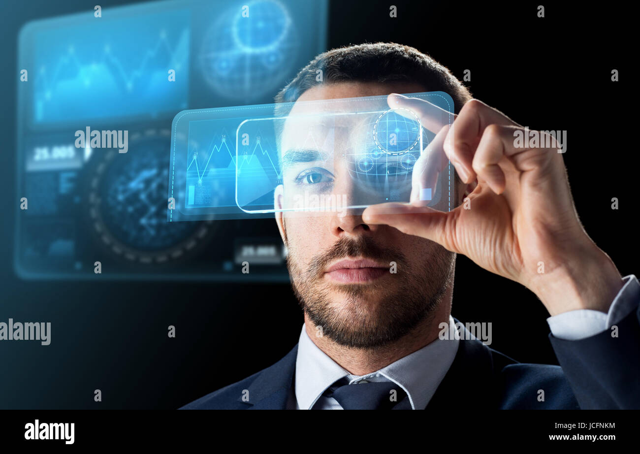 businessman with smartphone and virtual screens Stock Photo - Alamy