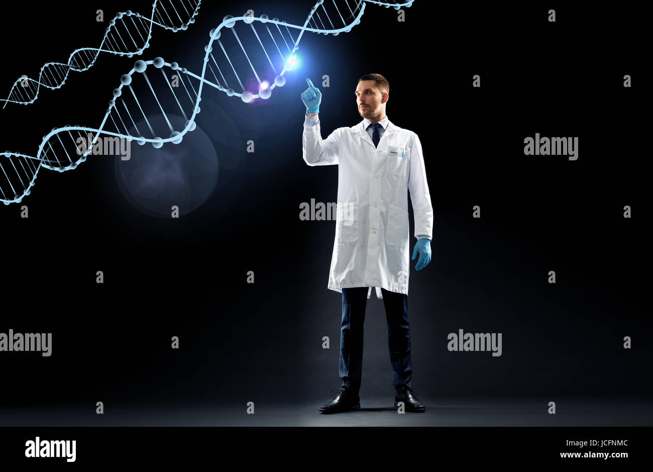 scientist in lab coat and medical gloves with dna Stock Photo - Alamy