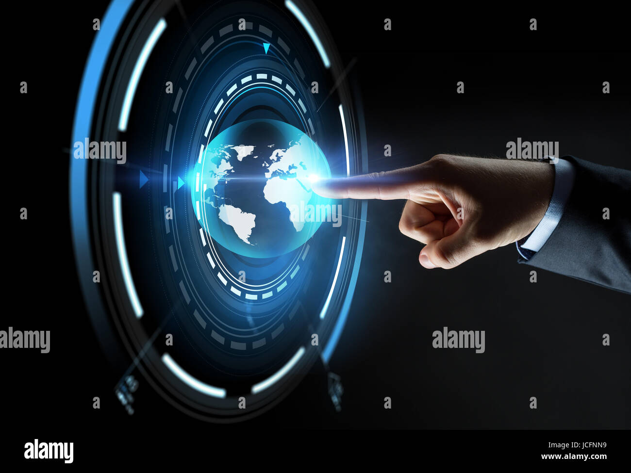 hand pointing finger to virtual earth projection Stock Photo - Alamy