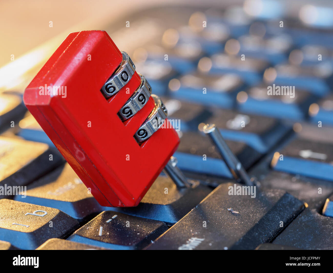 Computer keyboard and combination lock Stock Photo - Alamy
