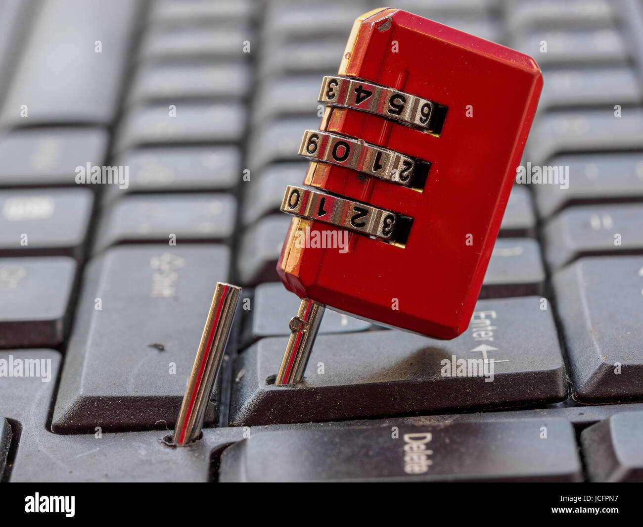 Computer keyboard and combination lock Stock Photo - Alamy