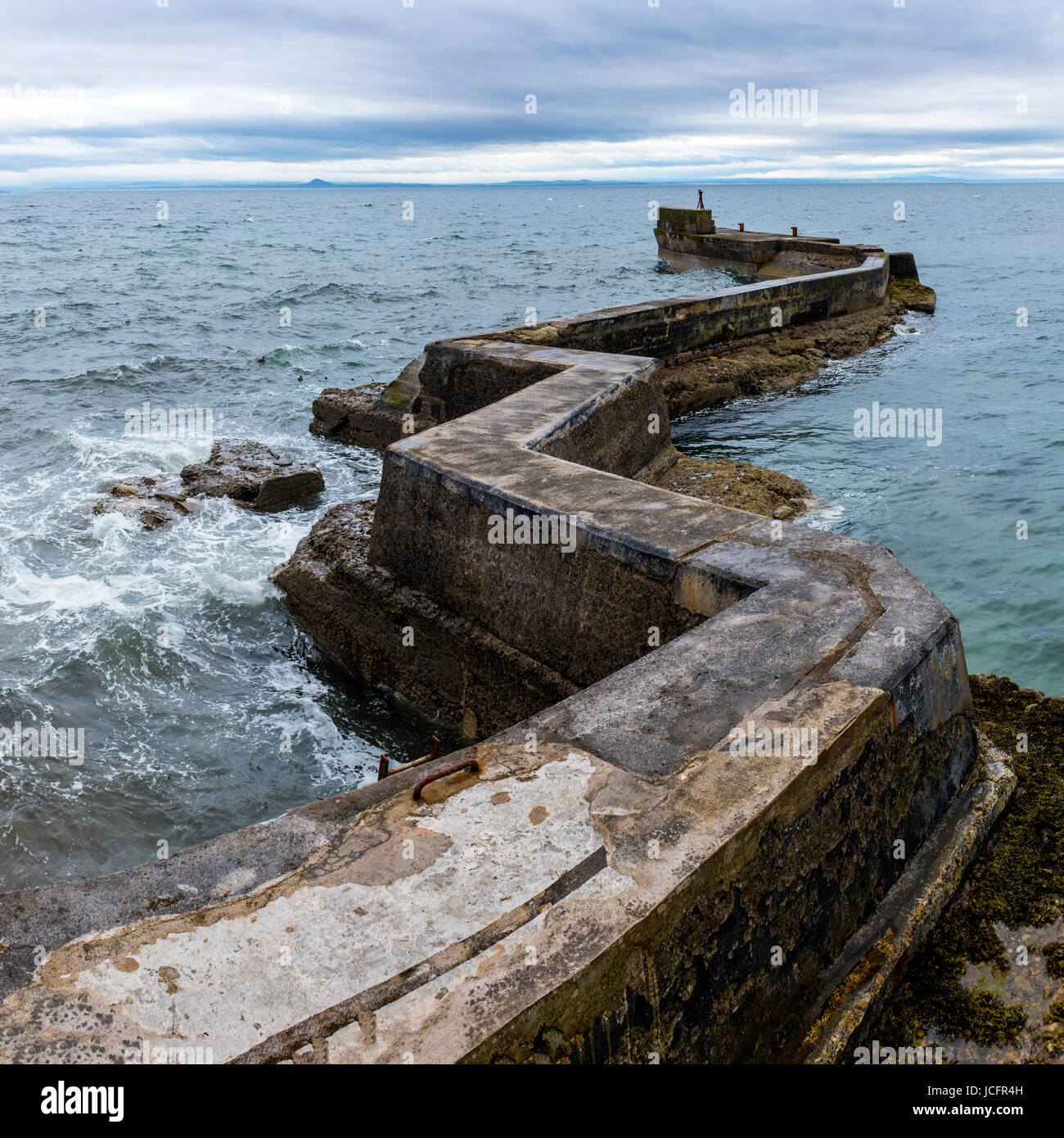 Zig Zag shaped breakwater at St Monans village on in East Neuk of Fife ...