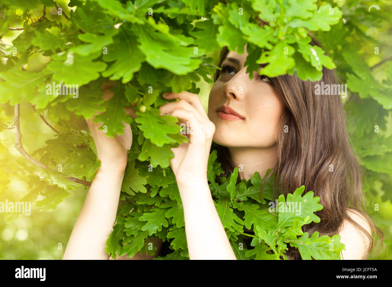 Portrait of happy beautiful woman in summer relaxing outside in the ...