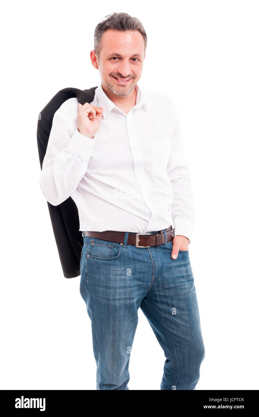 Handsome male holds a suit jacket over his shoulder and smiling ...