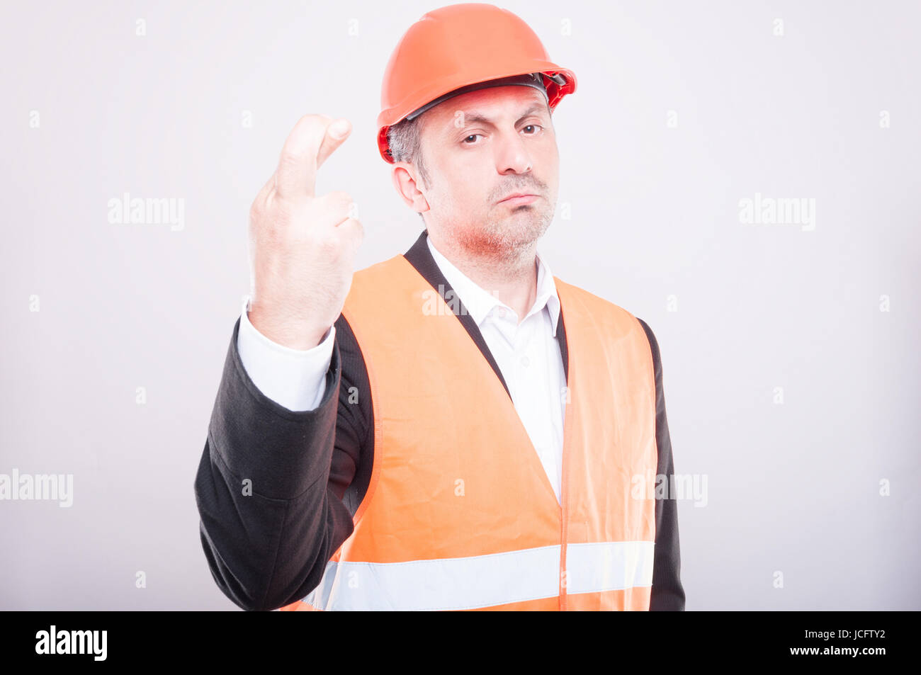 Architect wearing work helmet reflecting hi-res stock photography and ...