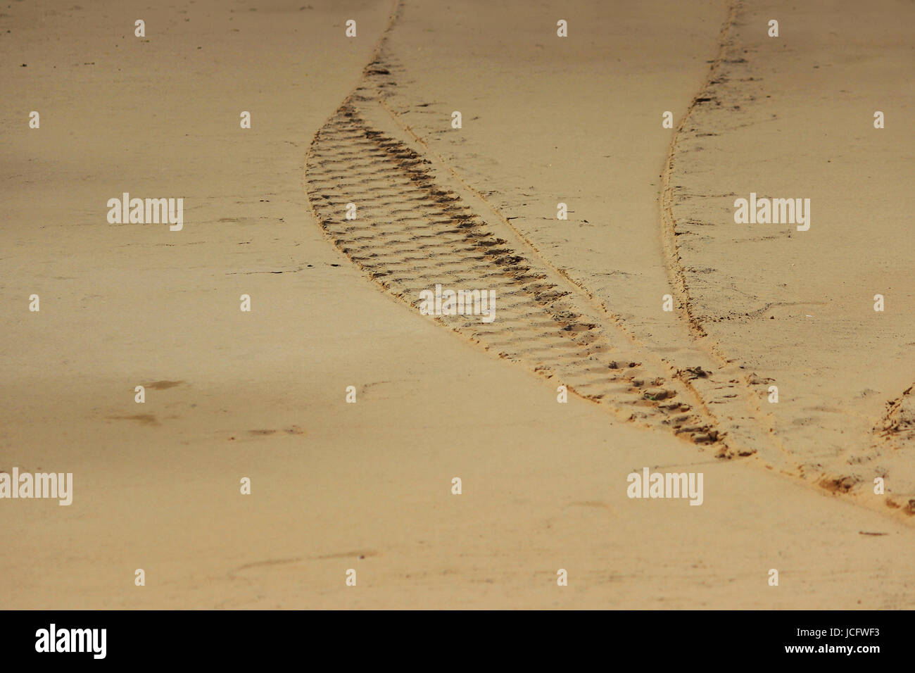 Sand as a base before laying asphalt, scattered by workers using ...