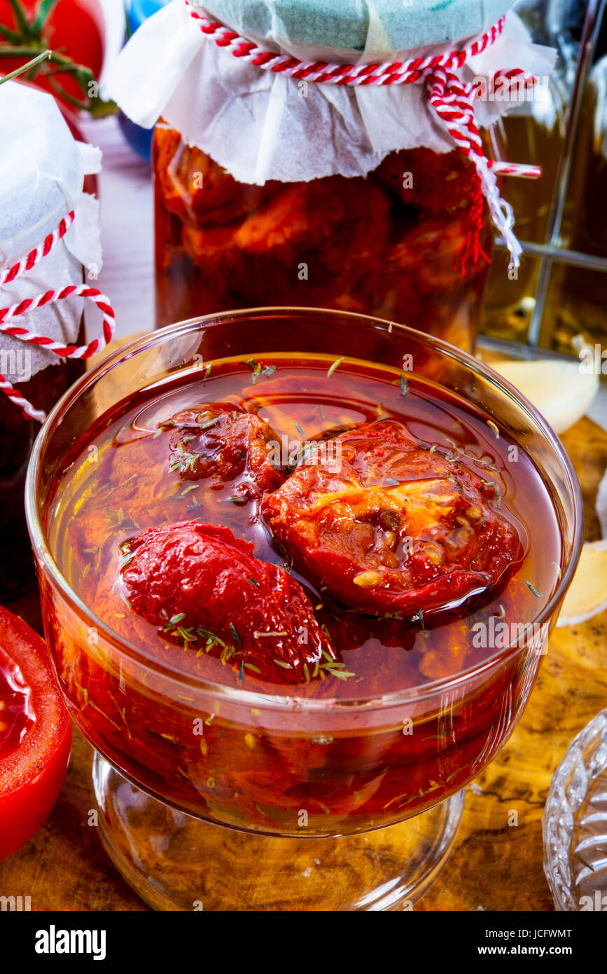 Dried tomatoes in olive oil Stock Photo - Alamy