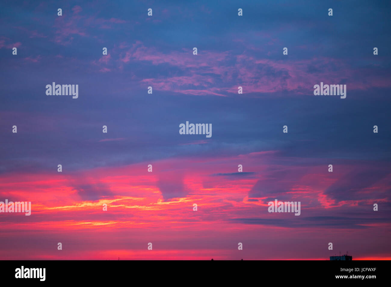 Bright dramatic sunset or sunrise with fire red and purple colors Stock ...