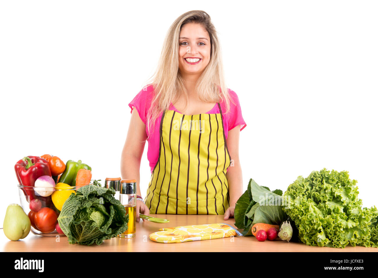 Beautiful woman cooking isolated in white Stock Photo - Alamy