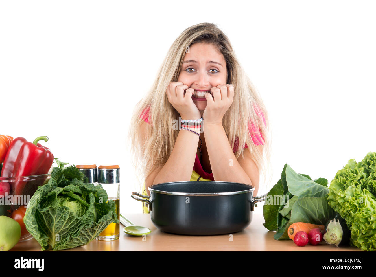 Stressed woman cooking in the kitchen Stock Photo - Alamy