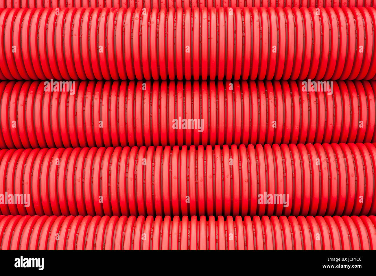Red pipes background Stock Photo - Alamy