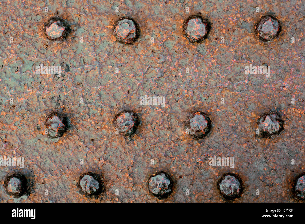 Background of the rivets on rusty metals Stock Photo - Alamy