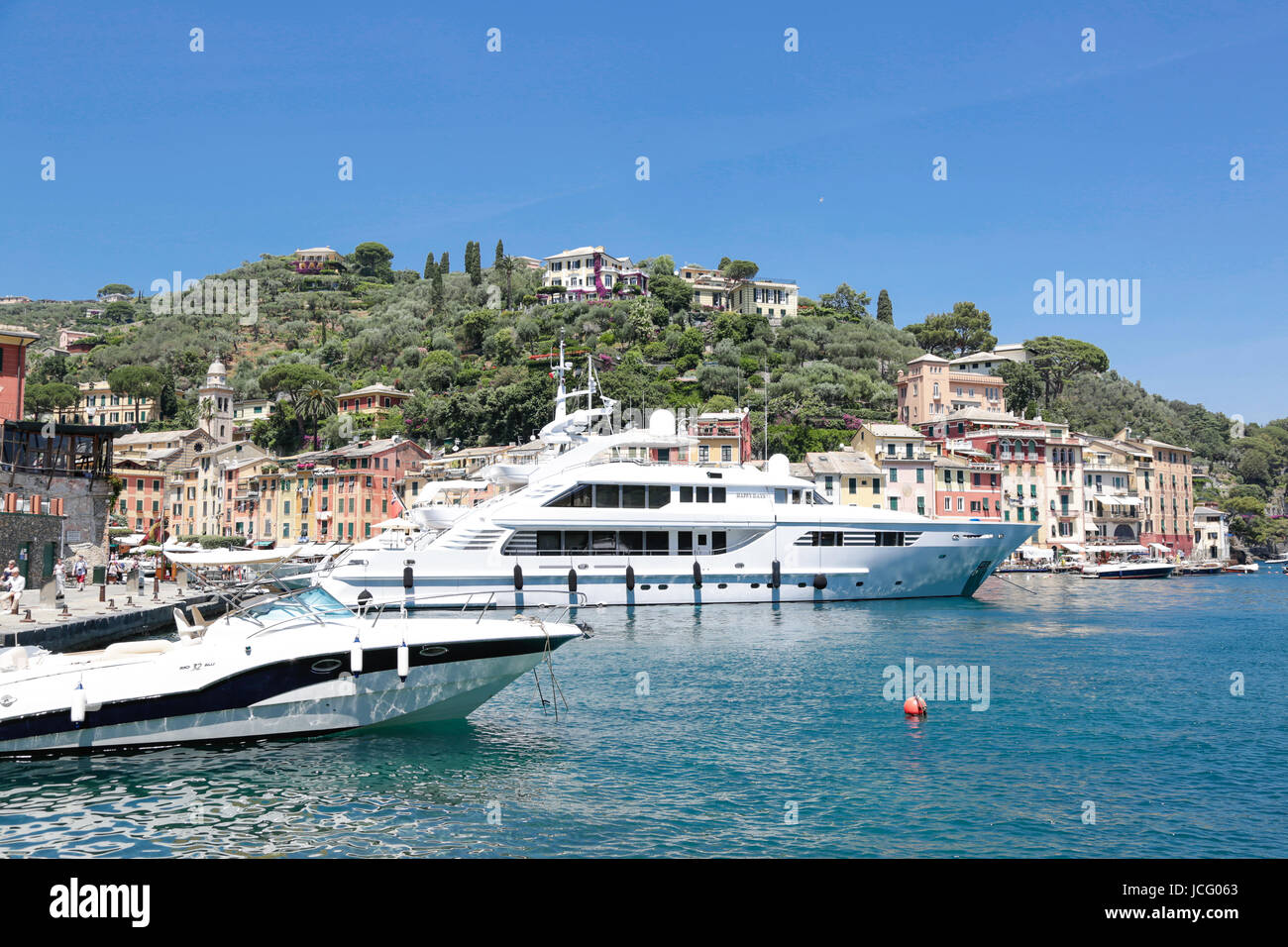 Portofino harbor with colorful historical house in the background ...