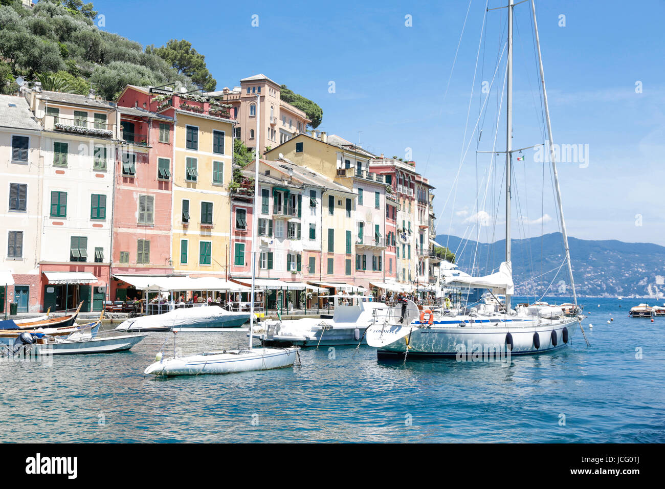 Portofino harbor with colorful historical house in the background ...