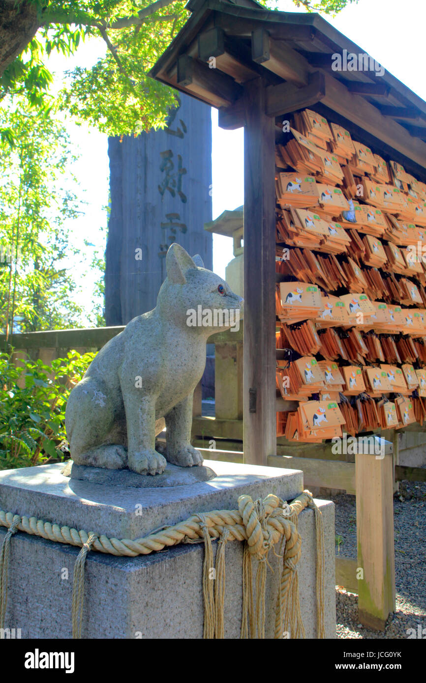 A Guardian Cat Komainu at Azusami-Tenjin-sha Shinto Shrine in Tachikawa ...