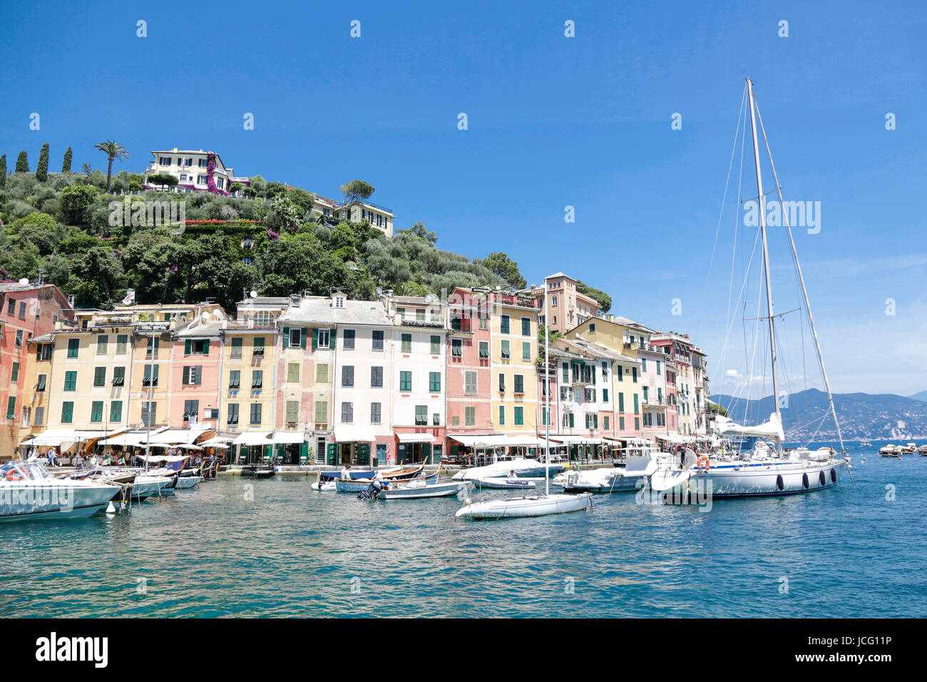 Portofino harbor with colorful historical house in the background ...