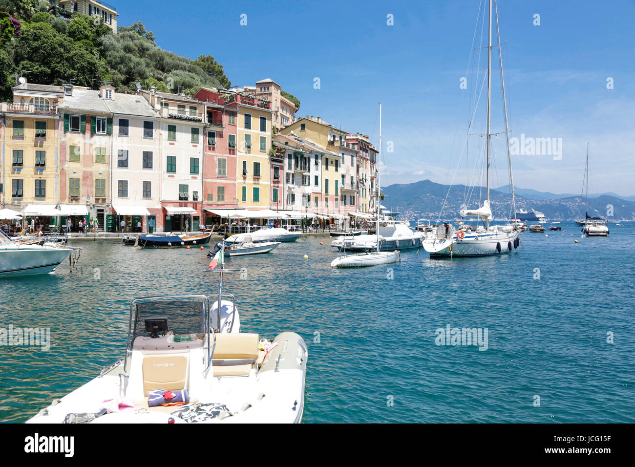 Portofino harbor with colorful historical house in the background ...