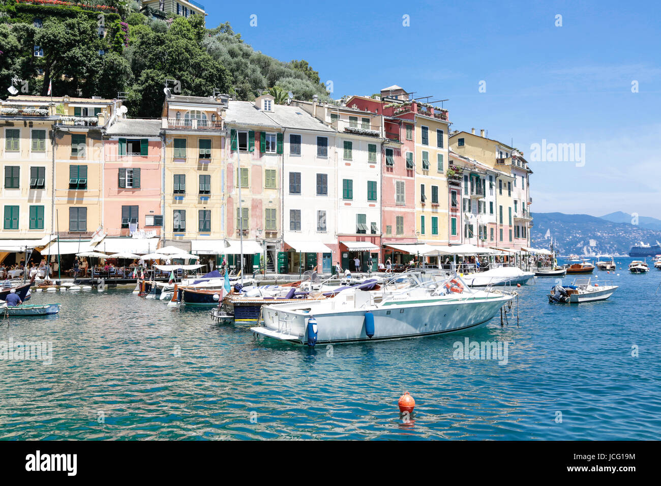 Portofino harbor with colorful historical house in the background ...
