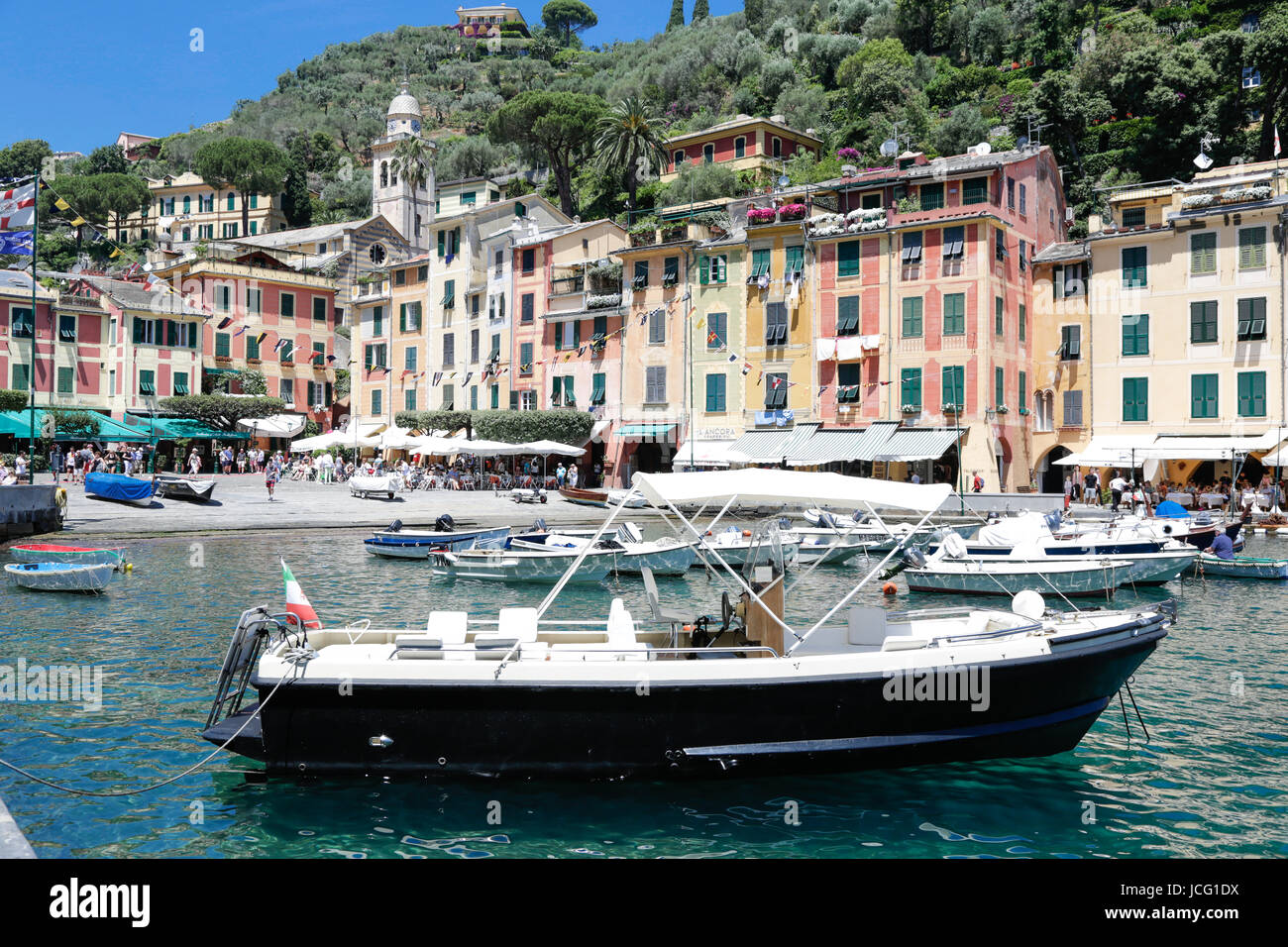 Portofino harbor with colorful historical house in the background ...