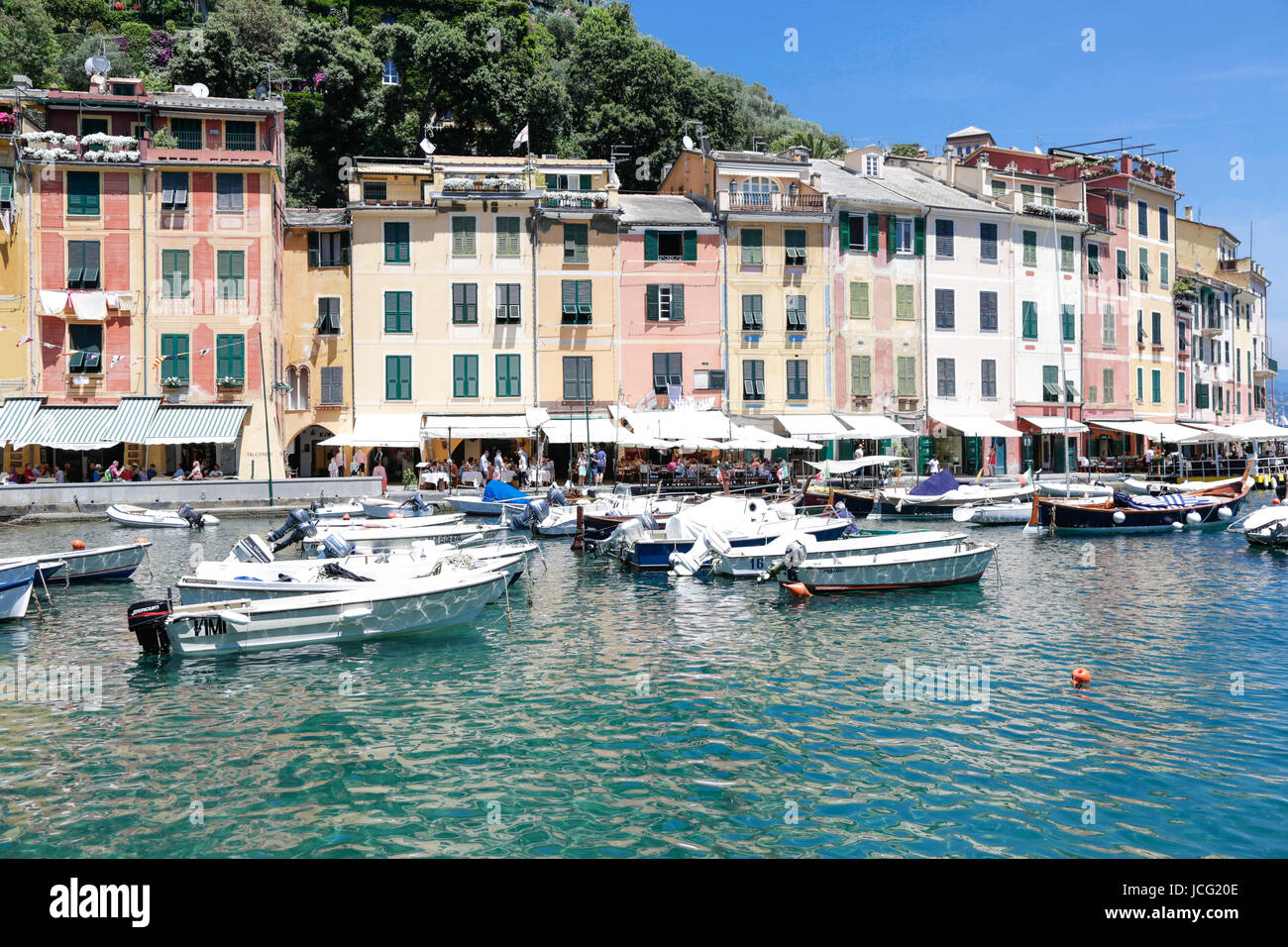Portofino harbor with colorful historical house in the background ...