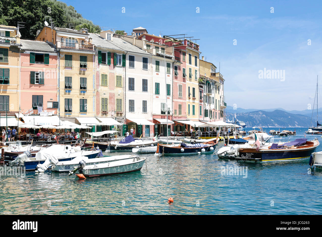 Portofino harbor with colorful historical house in the background ...