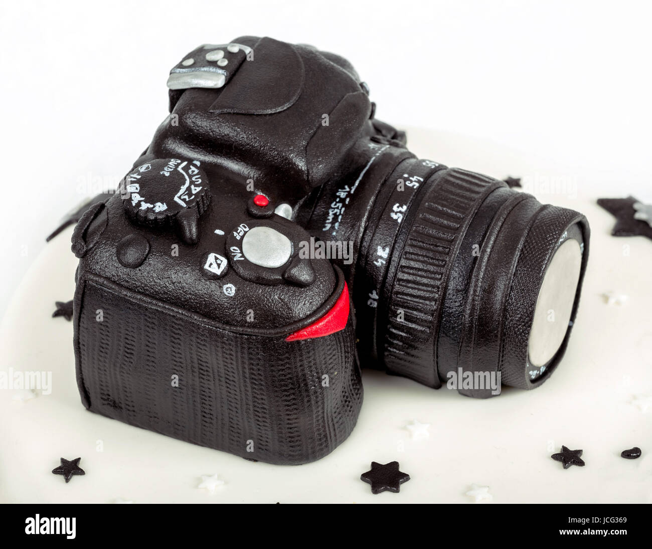 birthday cake for forty anniversary with modern DSLR photo camera ...