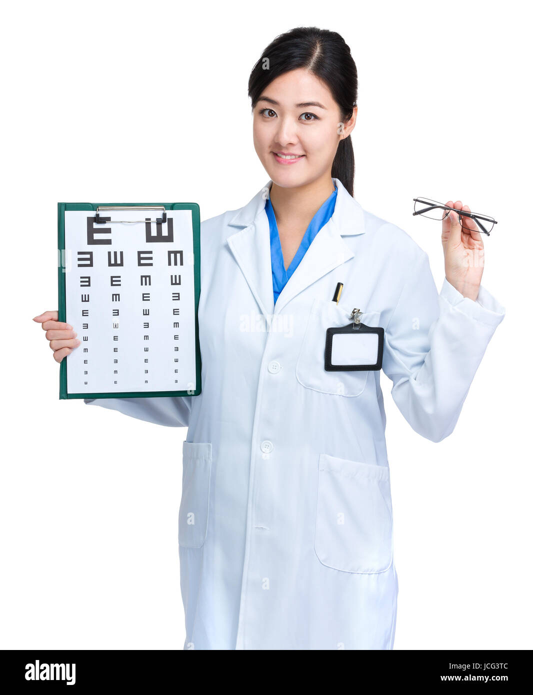 Optician doctor with eye chart and glasses Stock Photo - Alamy