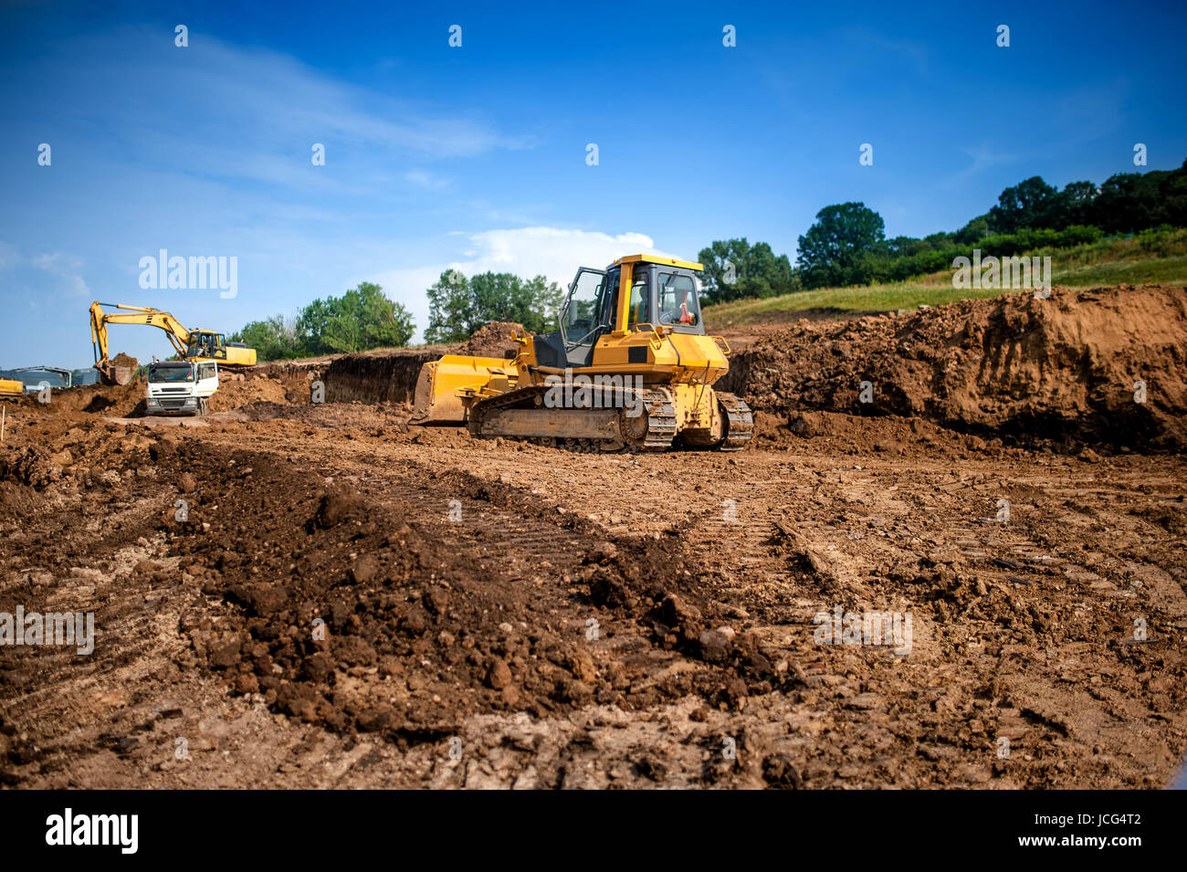 industrial machinery at working construction building site. Excavator ...