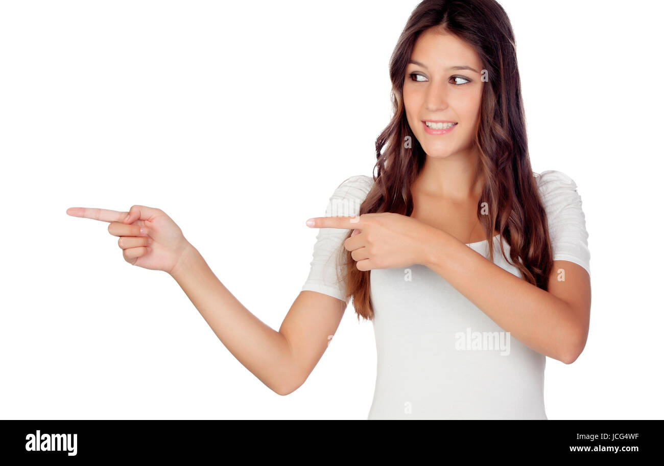 Attractive casual girl pointing at side something isolated on white ...