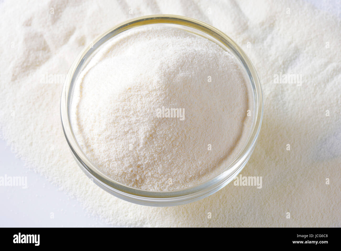 Bowl of full cream powdered milk Stock Photo - Alamy