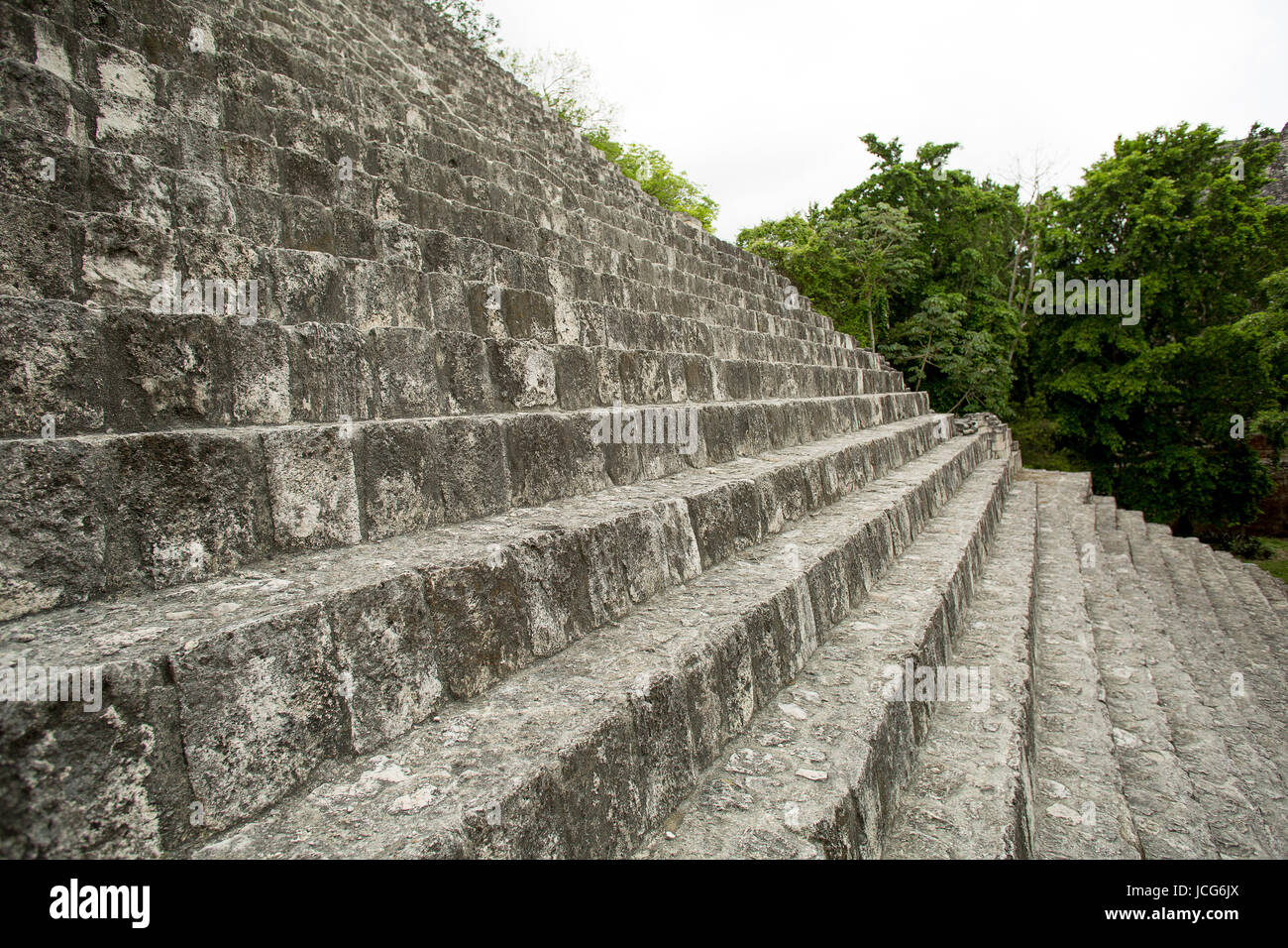 ancient pyramid stone stairs with green trees in the background Stock ...