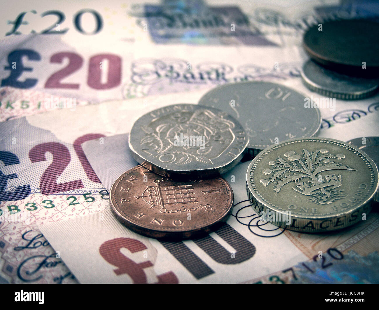 Vintage looking Detail of British Pounds banknotes and coins Stock ...