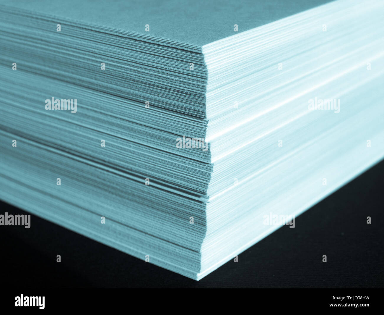 Blank sheets of A4 paper for office use - cool cyanotype Stock Photo ...