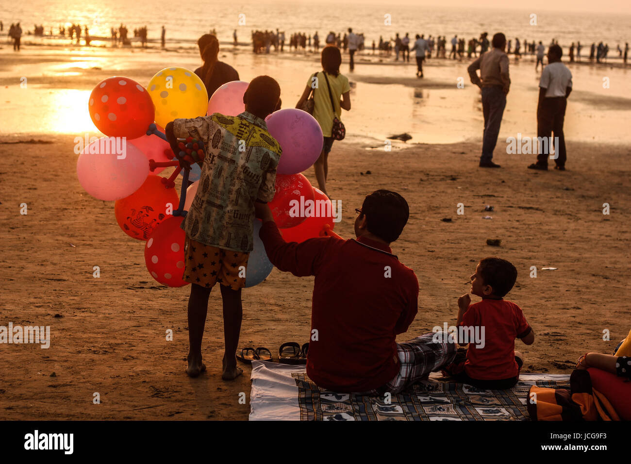 Boy selling balloons hi-res stock photography and images - Alamy