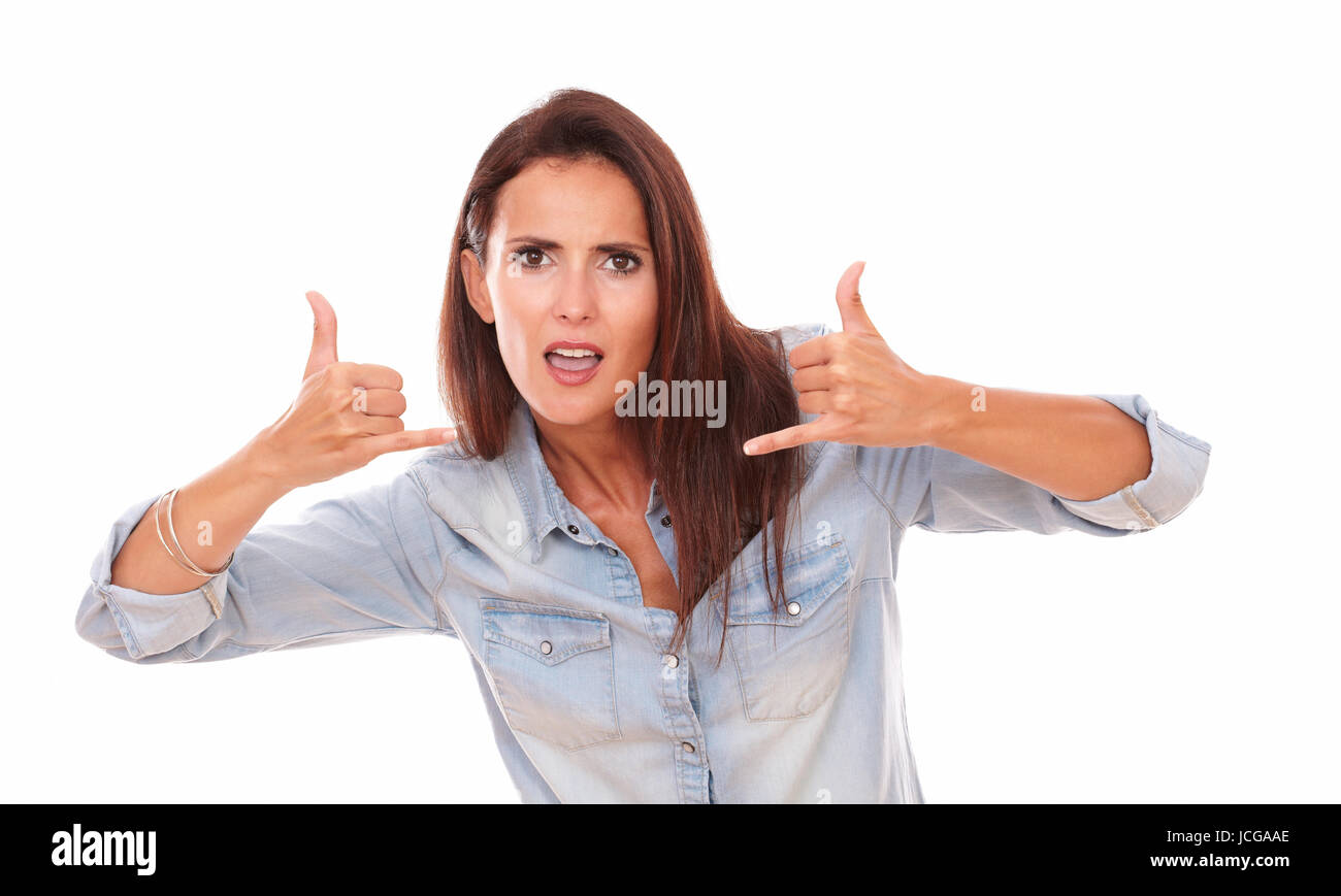 Portrait of adult careless brunette on blue shirt with calling sign and ...
