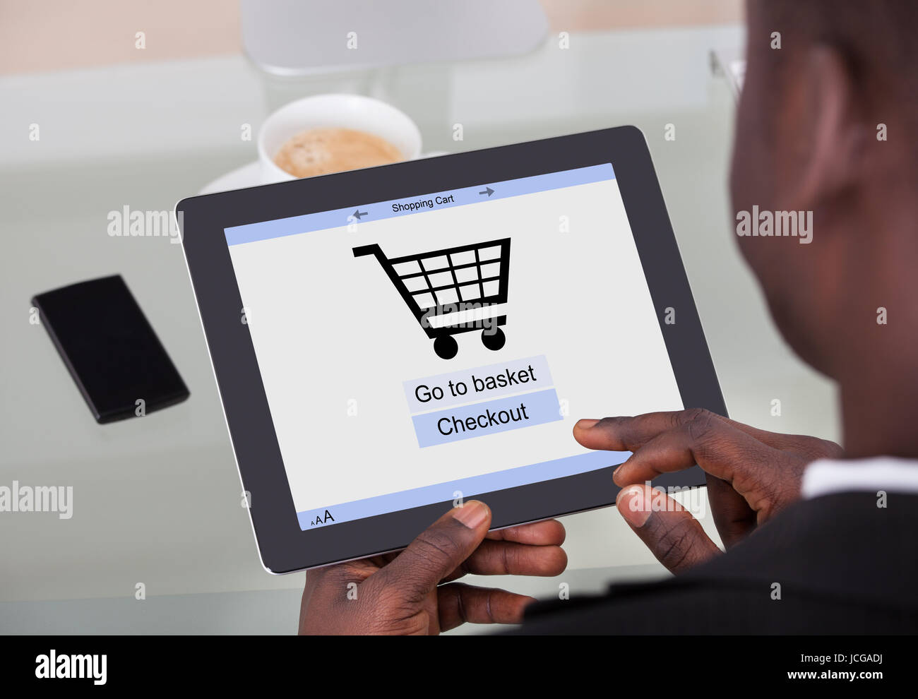 African Businessman Holding Digital Tablet With Online Shopping ...