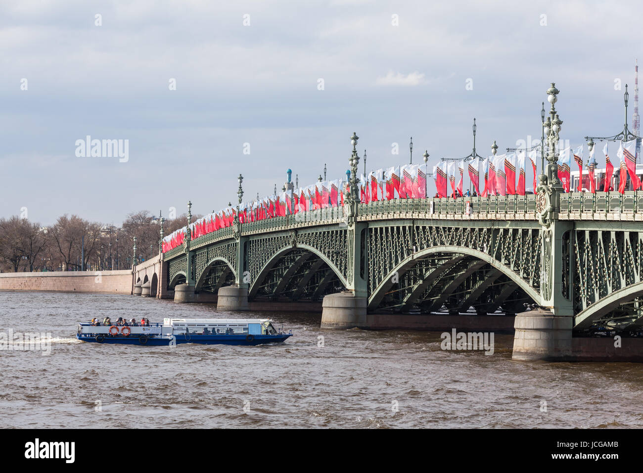 Row of festive flags with a St. George ribbon on Trinity bridge, set in ...
