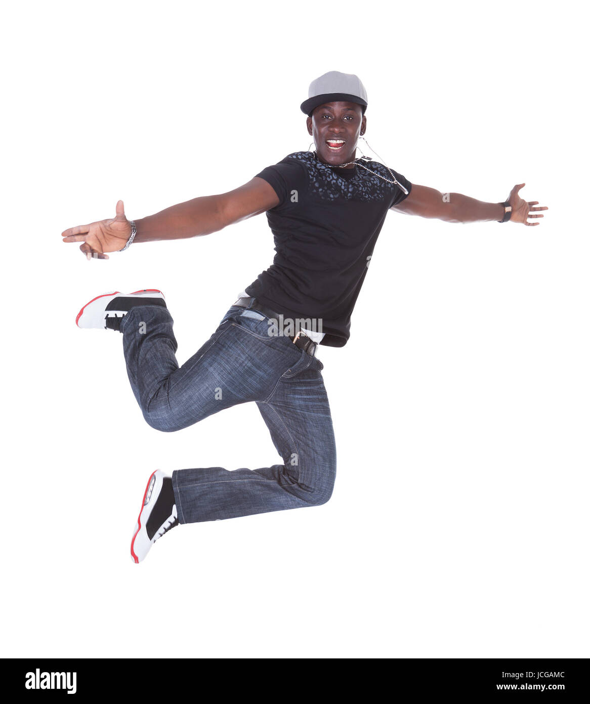Happy African Young Man Dancing Over White Background Stock Photo - Alamy