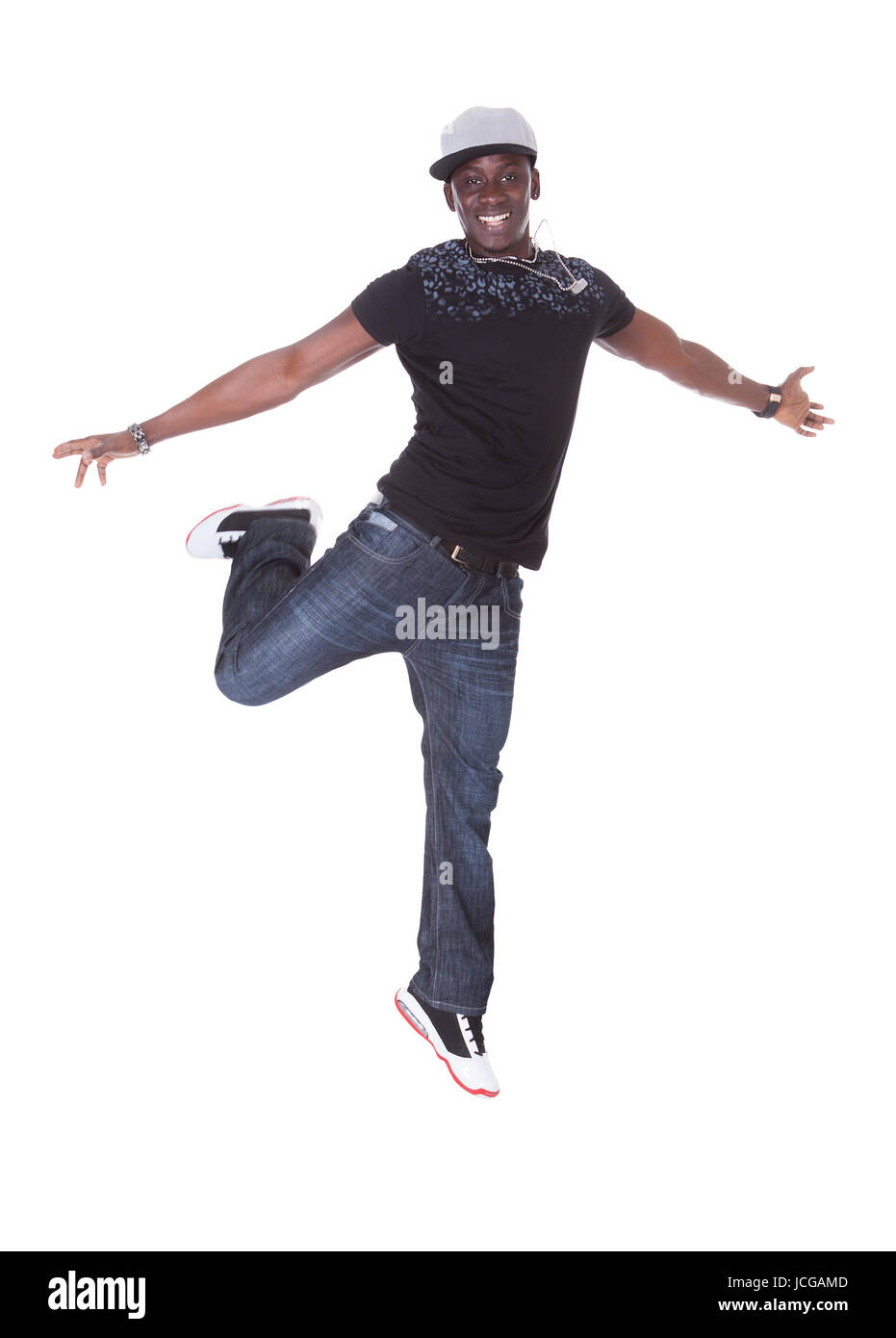 Happy African Young Man Dancing Over White Background Stock Photo - Alamy